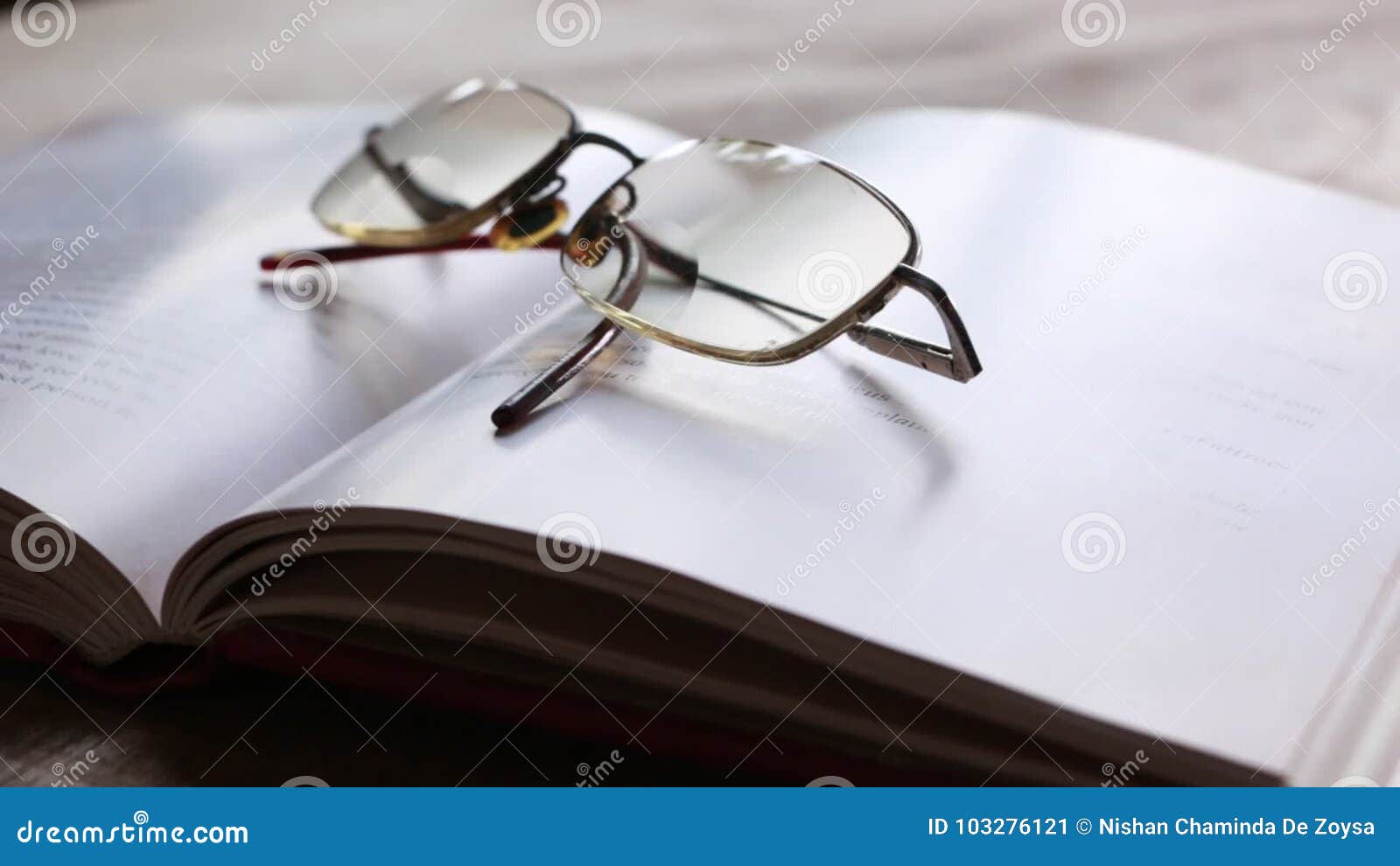 Spectacles and a Book stock video. Video of information - 103276121