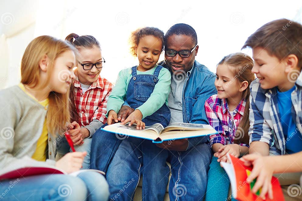 Reading in group stock photo. Image of group, kindergarten - 66009586