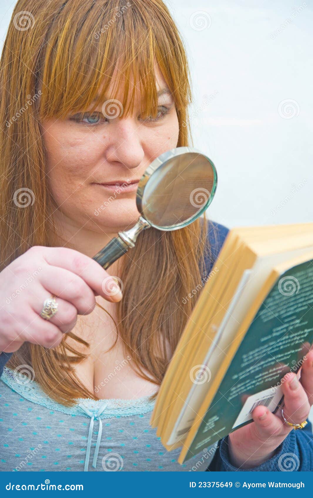 Reading with a Hand Magnifier. Stock Image - Image of studying ...