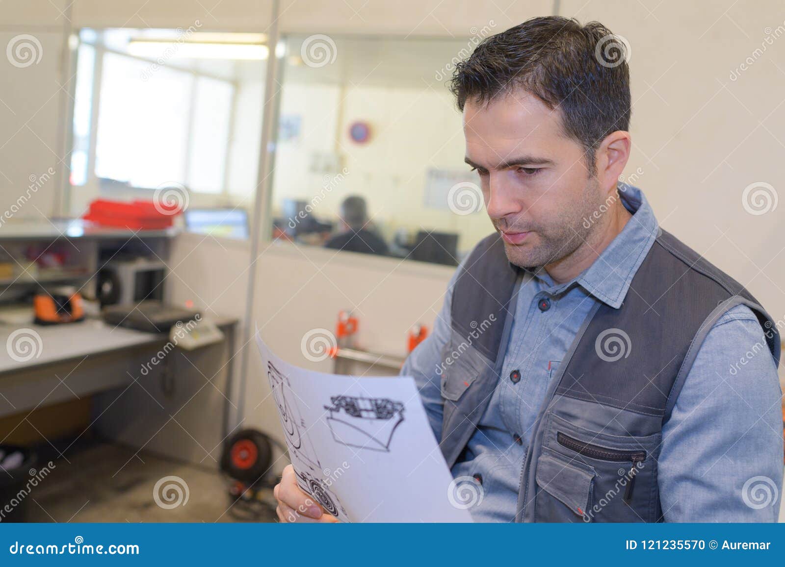 Reading the Instruction Manual Stock Photo - Image of artisanal ...