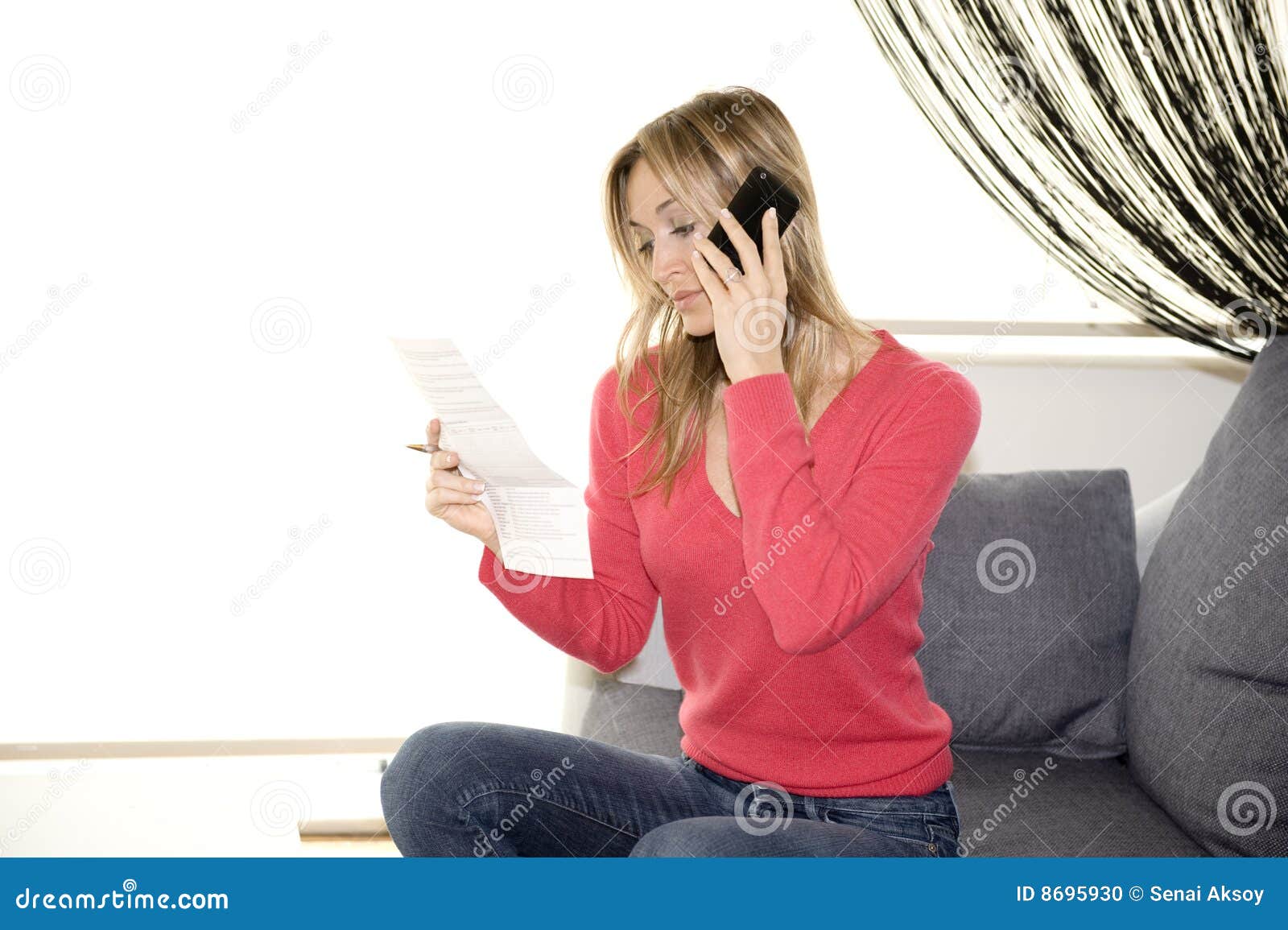 Reading Invoice and Talking on Cellphone Stock Photo - Image of bank ...