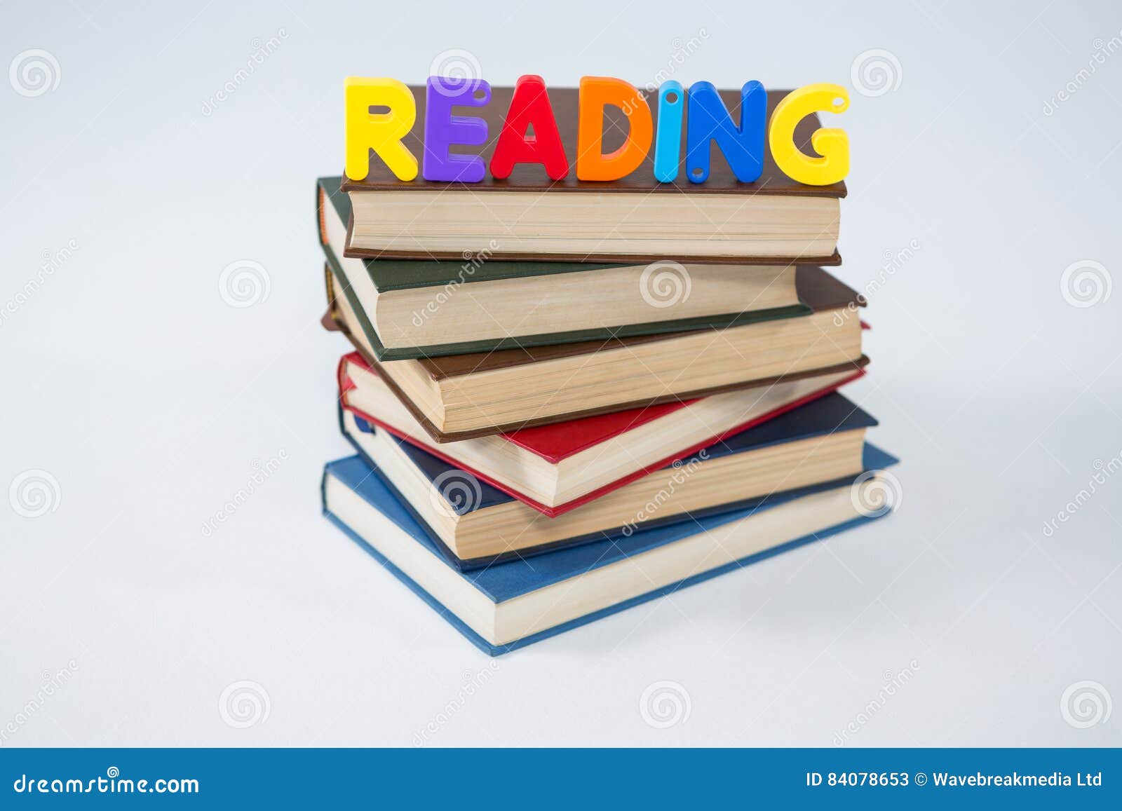 Reading Letter Blocks on Stack of Books Stock Image - Image of text ...