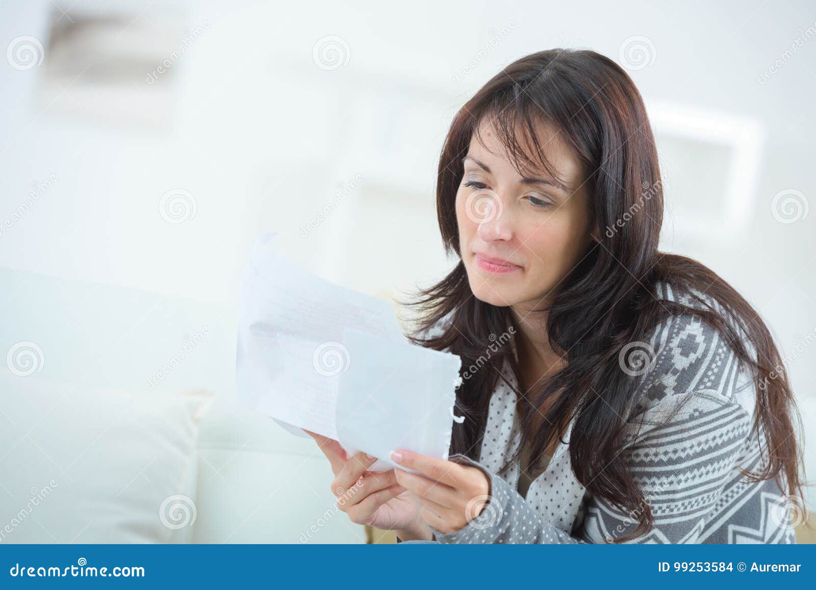 Reading letter at home stock photo. Image of attractive - 99253584