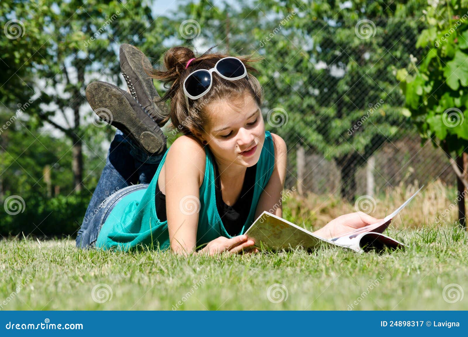 Reading a magazine stock image. Image of people, casual - 24898317