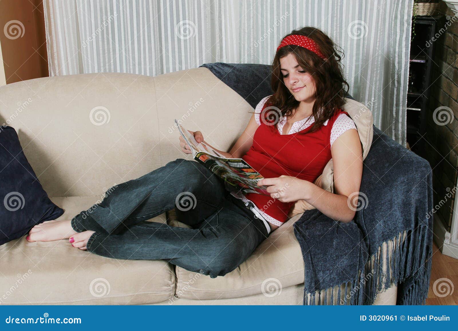 Reading a magazine stock image. Image of shirt, female - 3020961