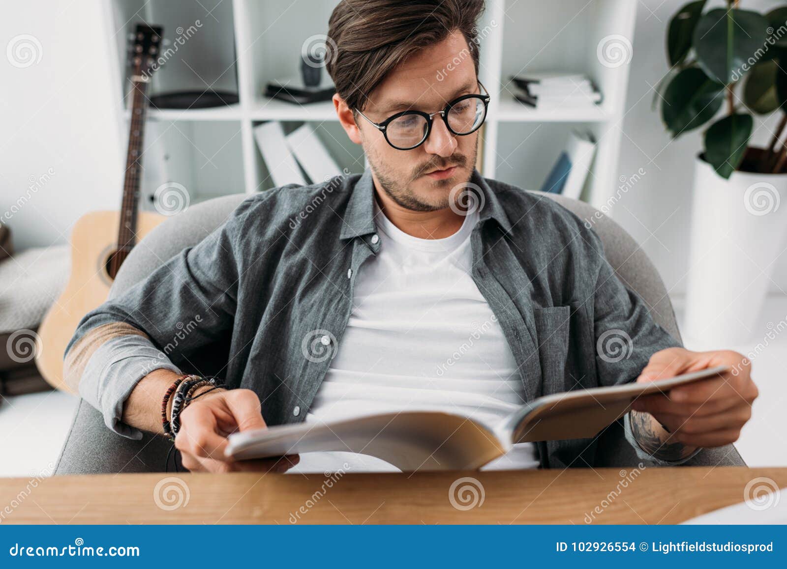 Reading magazine stock photo. Image of people, stylish - 102926554