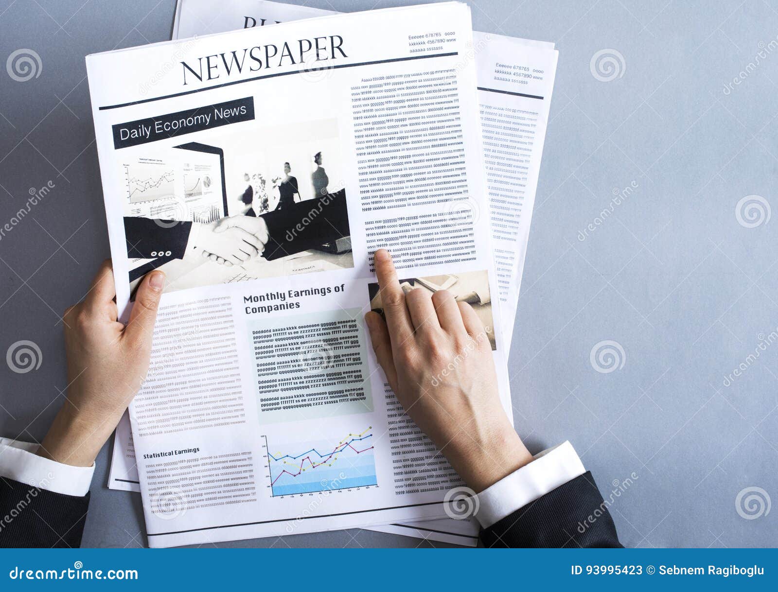 Reading newspaper on desk stock image. Image of desk - 93995423