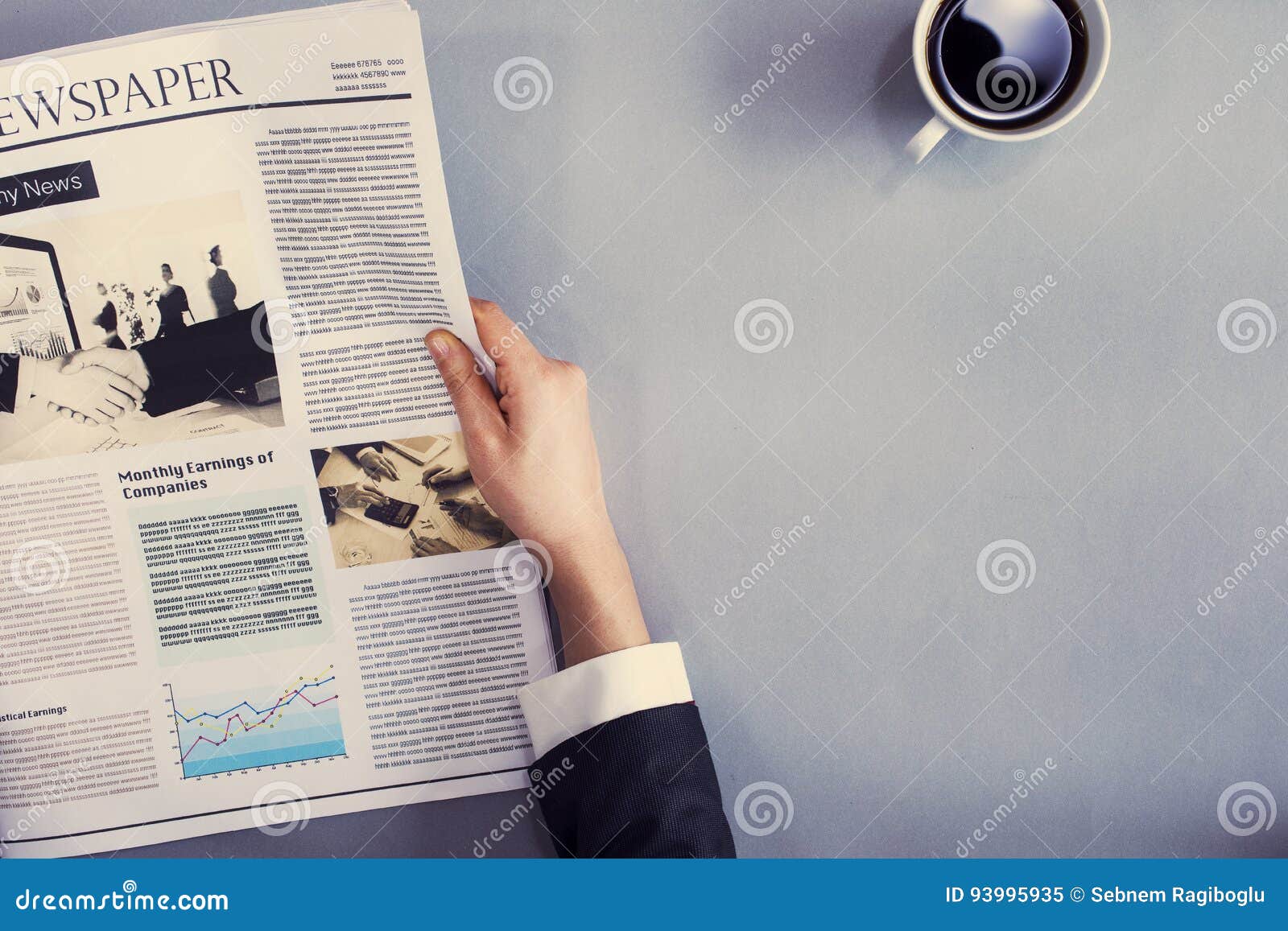 Reading newspaper on desk stock image. Image of text - 93995935