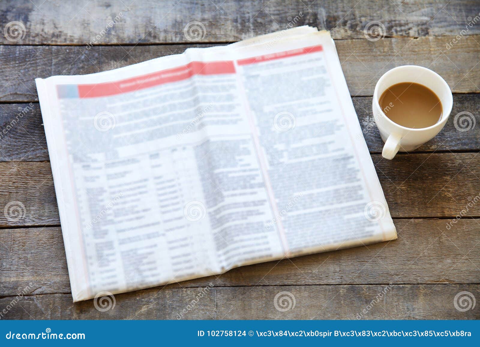 Reading newspaper on table stock photo. Image of office - 102758124