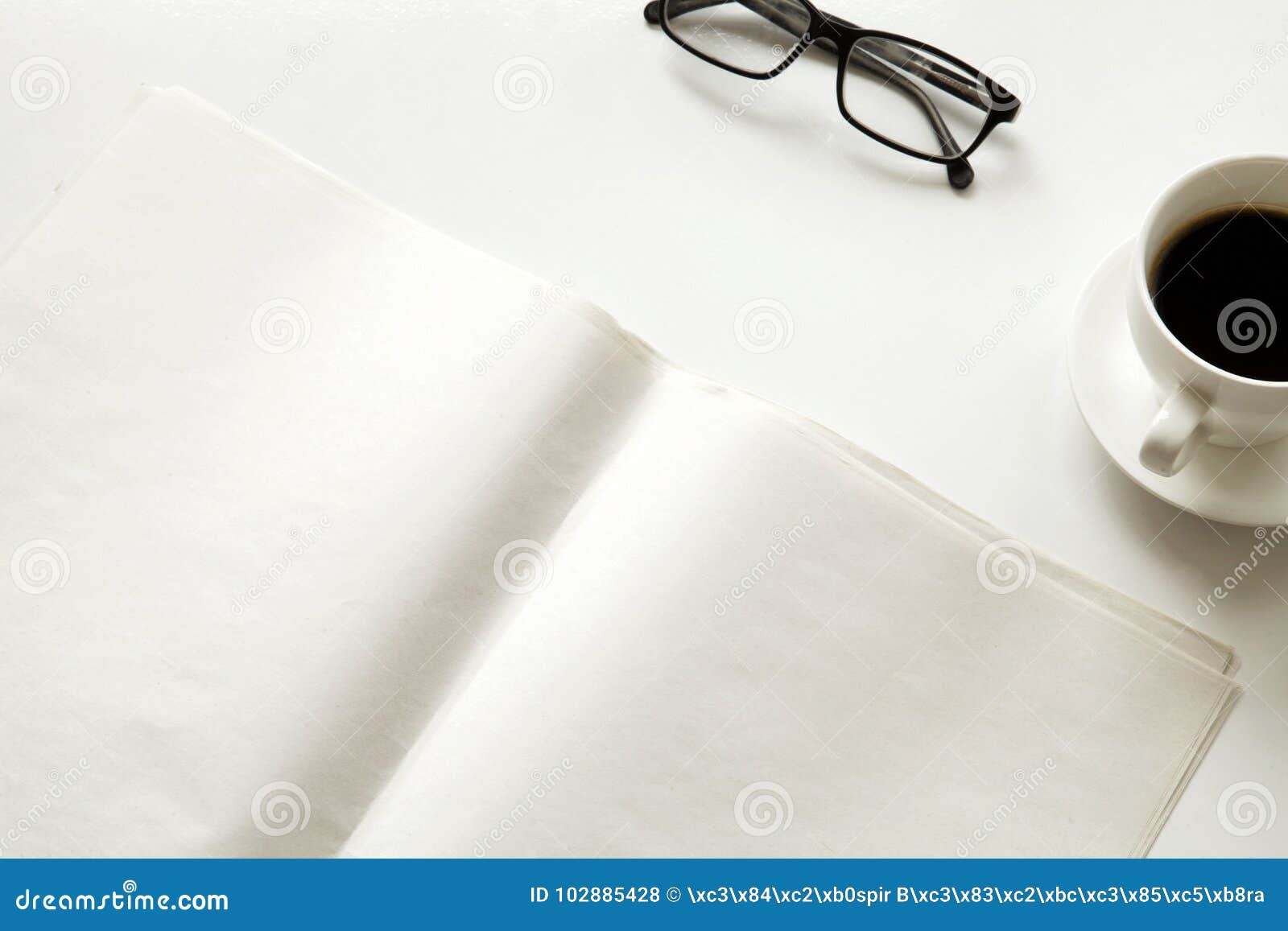 Reading newspaper on table stock photo. Image of coffee - 102885428