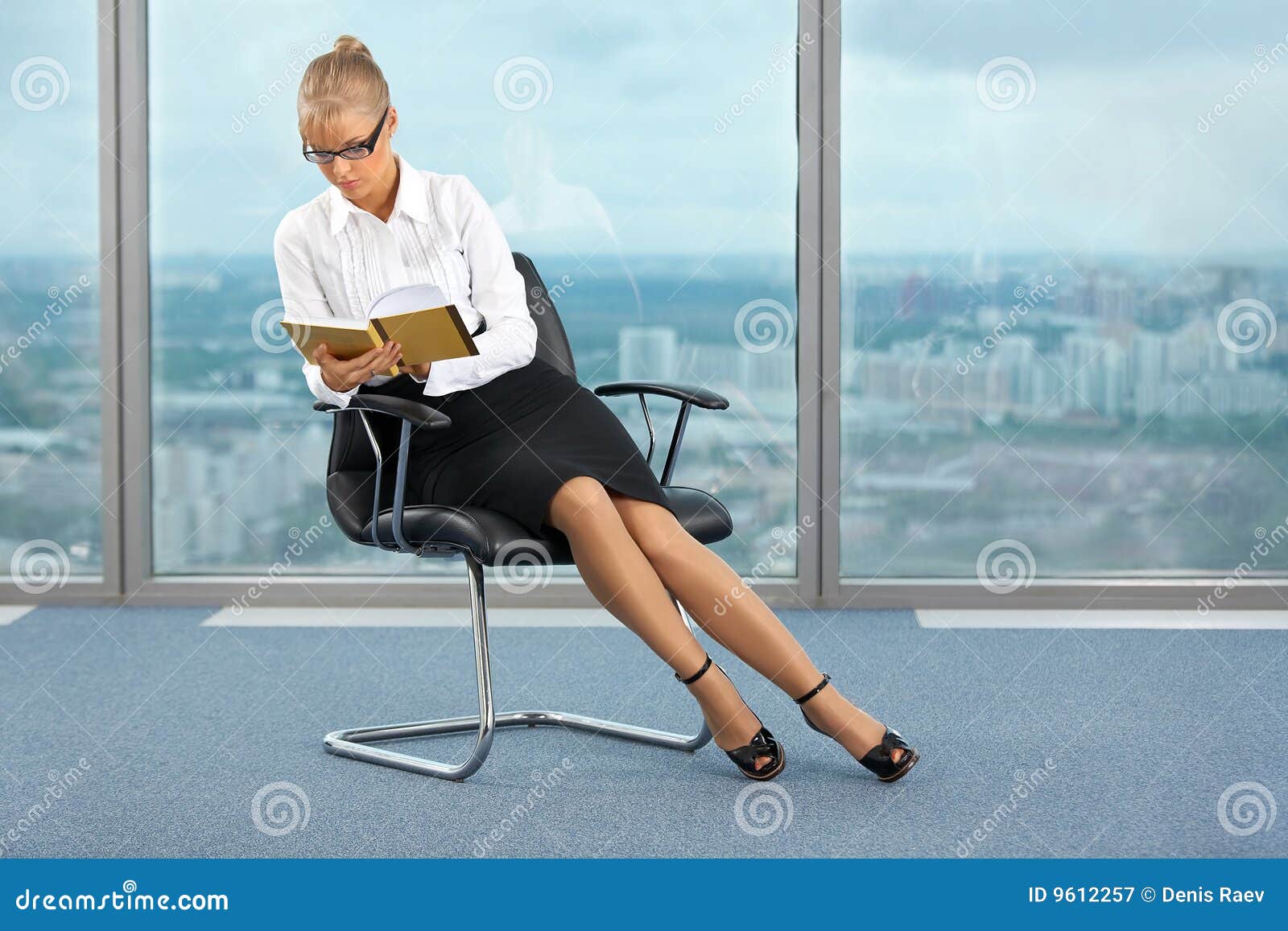 Reading at office stock image. Image of concentration - 9612257