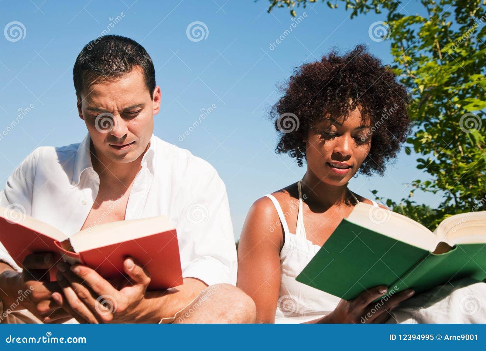 Reading outdoors stock image. Image of brazilian, black - 12394995