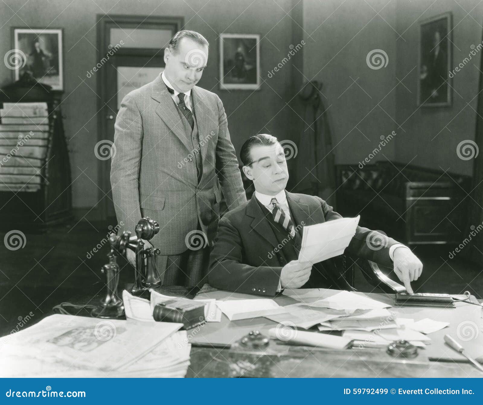 Reading over his shoulder stock image. Image of interior - 59792499