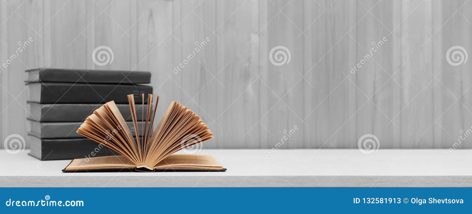 Reading a paper book stock image. Image of education - 132581913