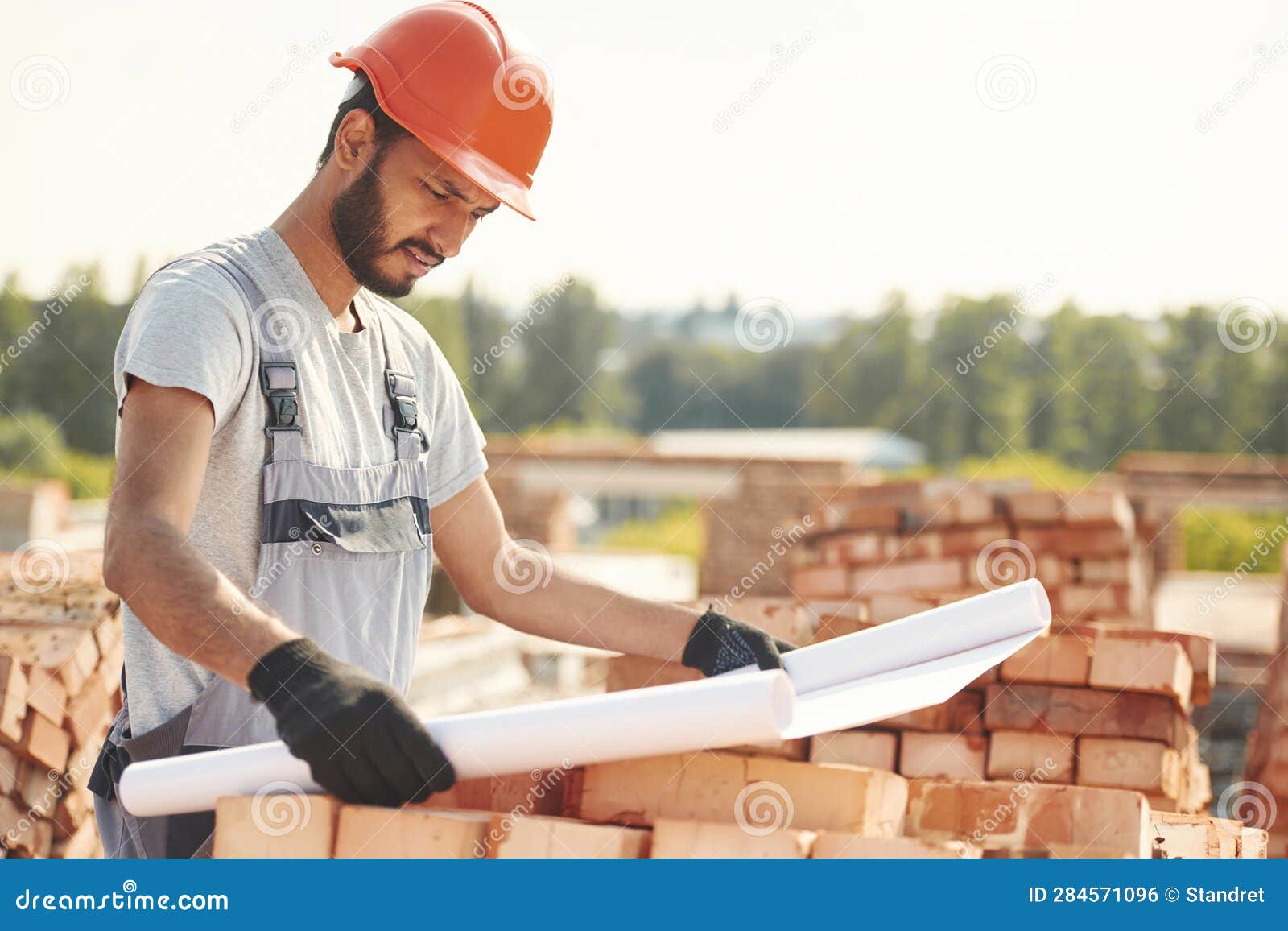 Man in Glasses is Standing with Indian Guy on the Construction Site ...