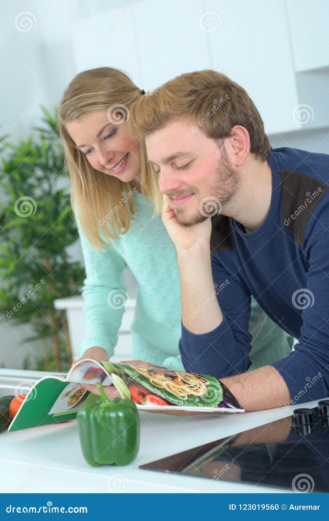 Reading the recipe book stock photo. Image of pleasure - 123019560