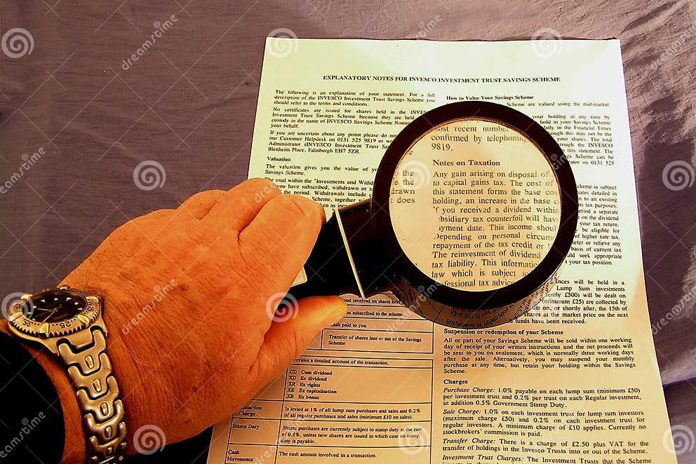 Reading the small print stock image. Image of business, document - 65995