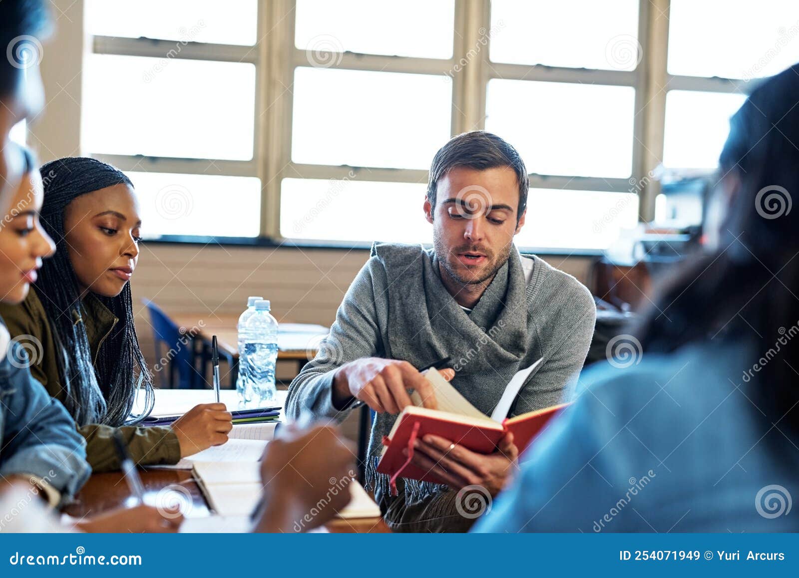 Reading Them His Study Notes. a Group of Young University Students ...