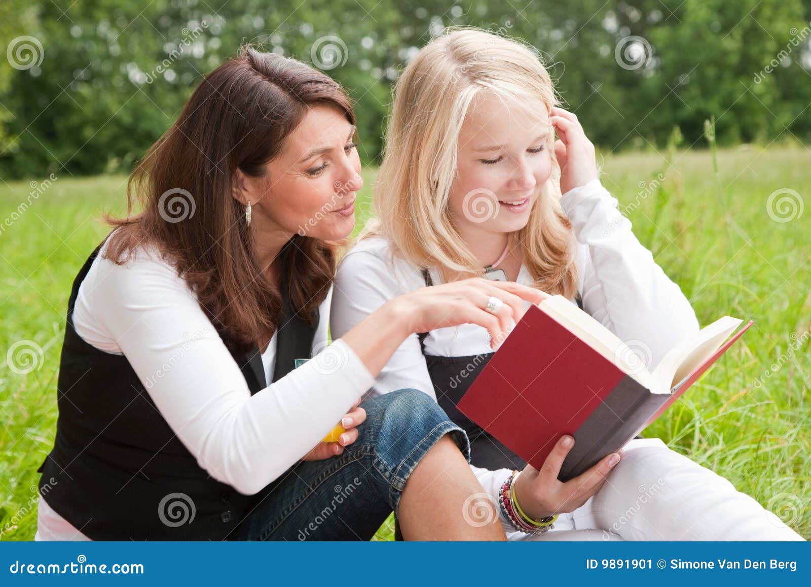 Reading together stock image. Image of together, outdoors - 9891901