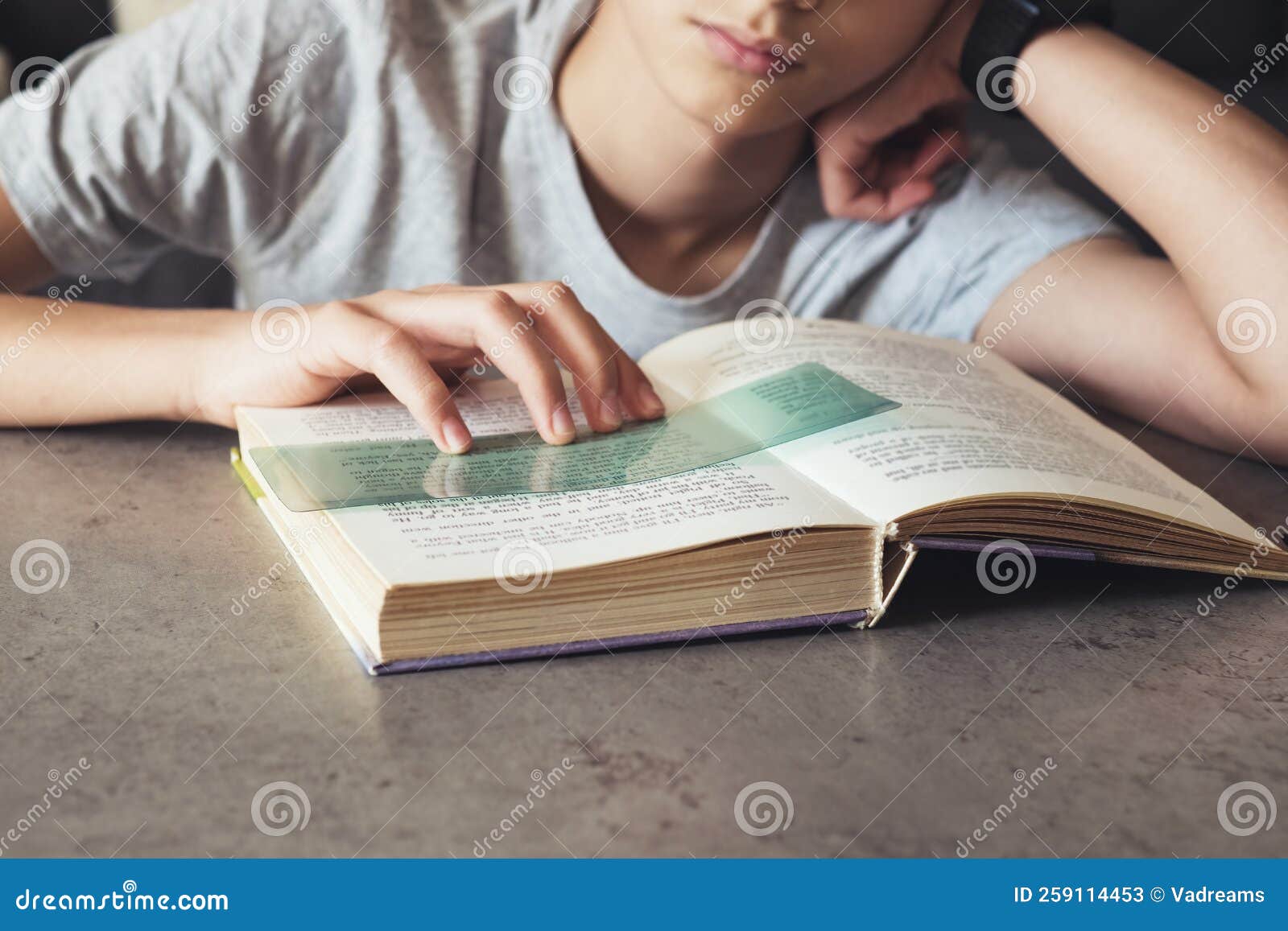 Reading Tools for Dyslexia. Child Reading Book Using Colorful Ruler ...