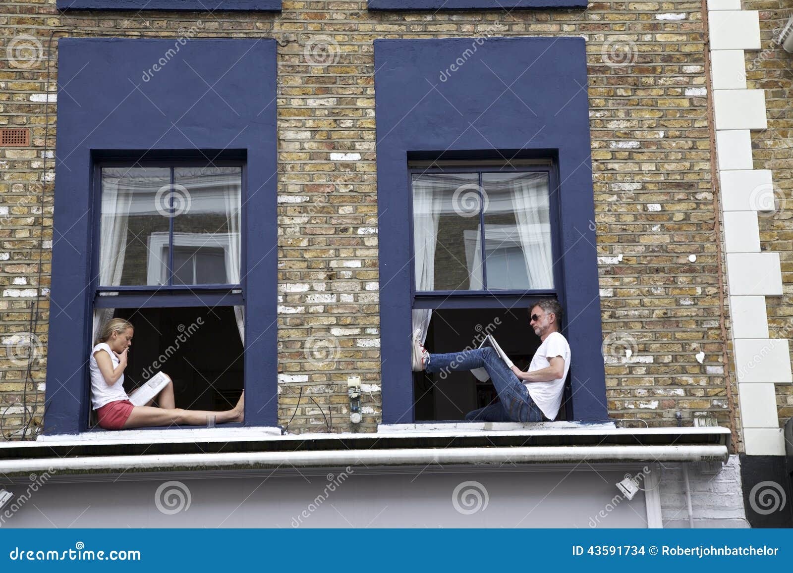 Reading In The Window Editorial Image | CartoonDealer.com #43591734