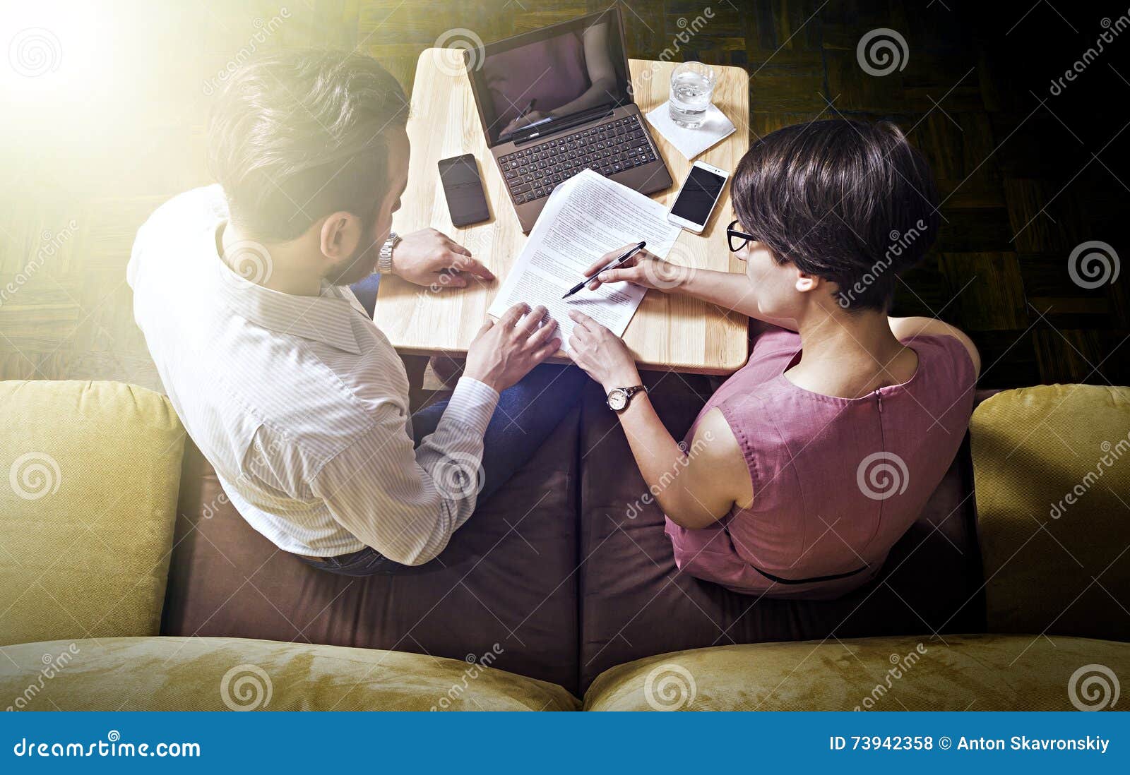 Reading working papers stock photo. Image of couple, coworkers - 73942358