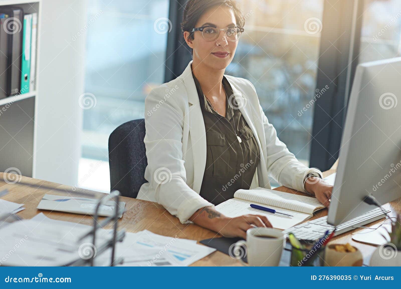 Always Ready for Any Challenge. Portrait of a Businesswoman Working on ...