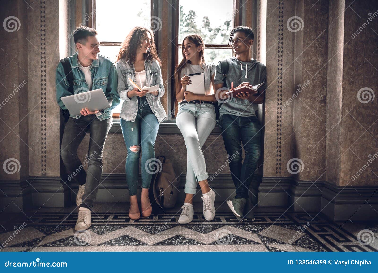 We are Ready for Exams!Multiracial Students Standing Near Window and ...