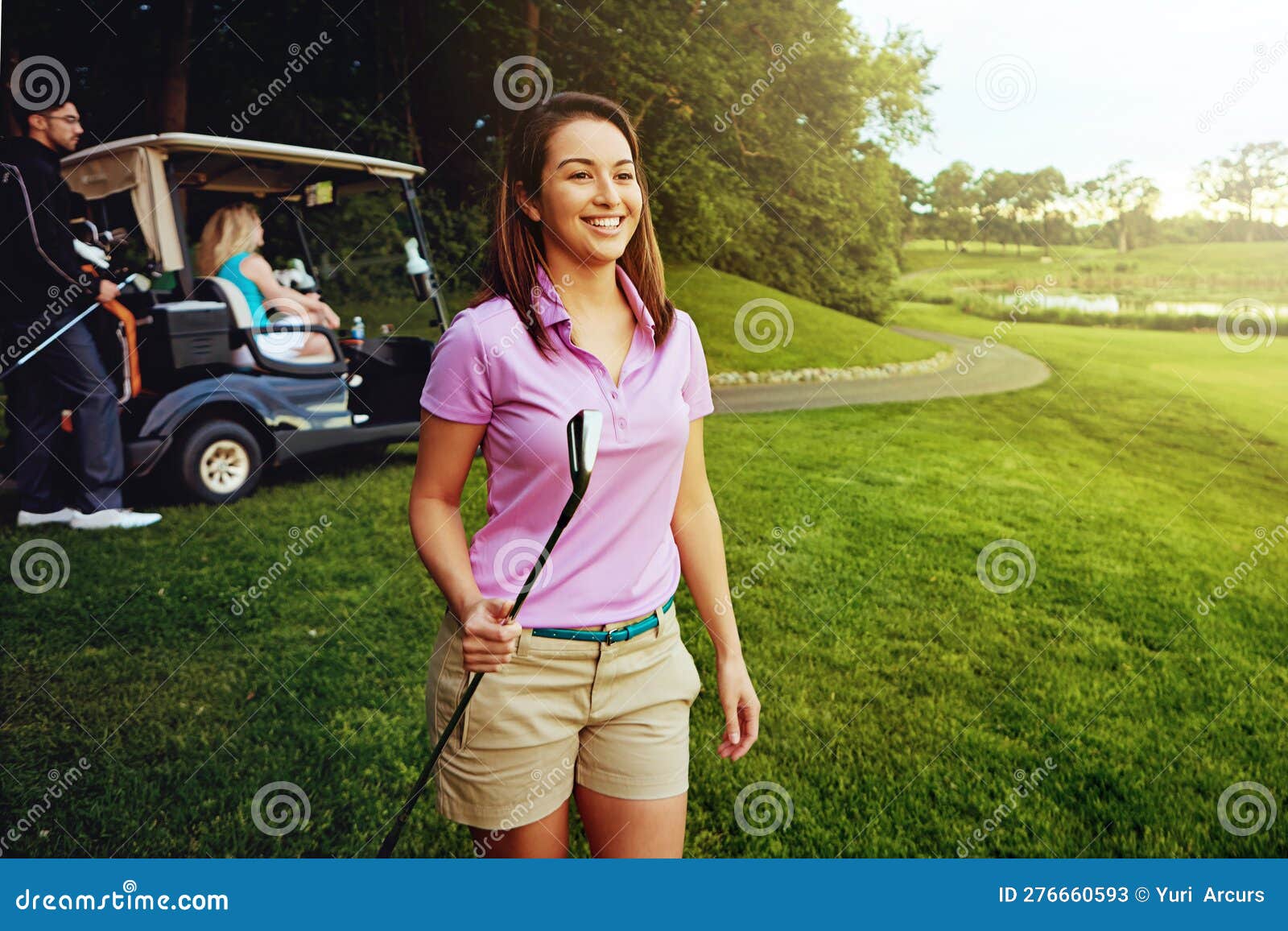 Ready for the First Round. a Woman Playing a Round of Golf with Her ...