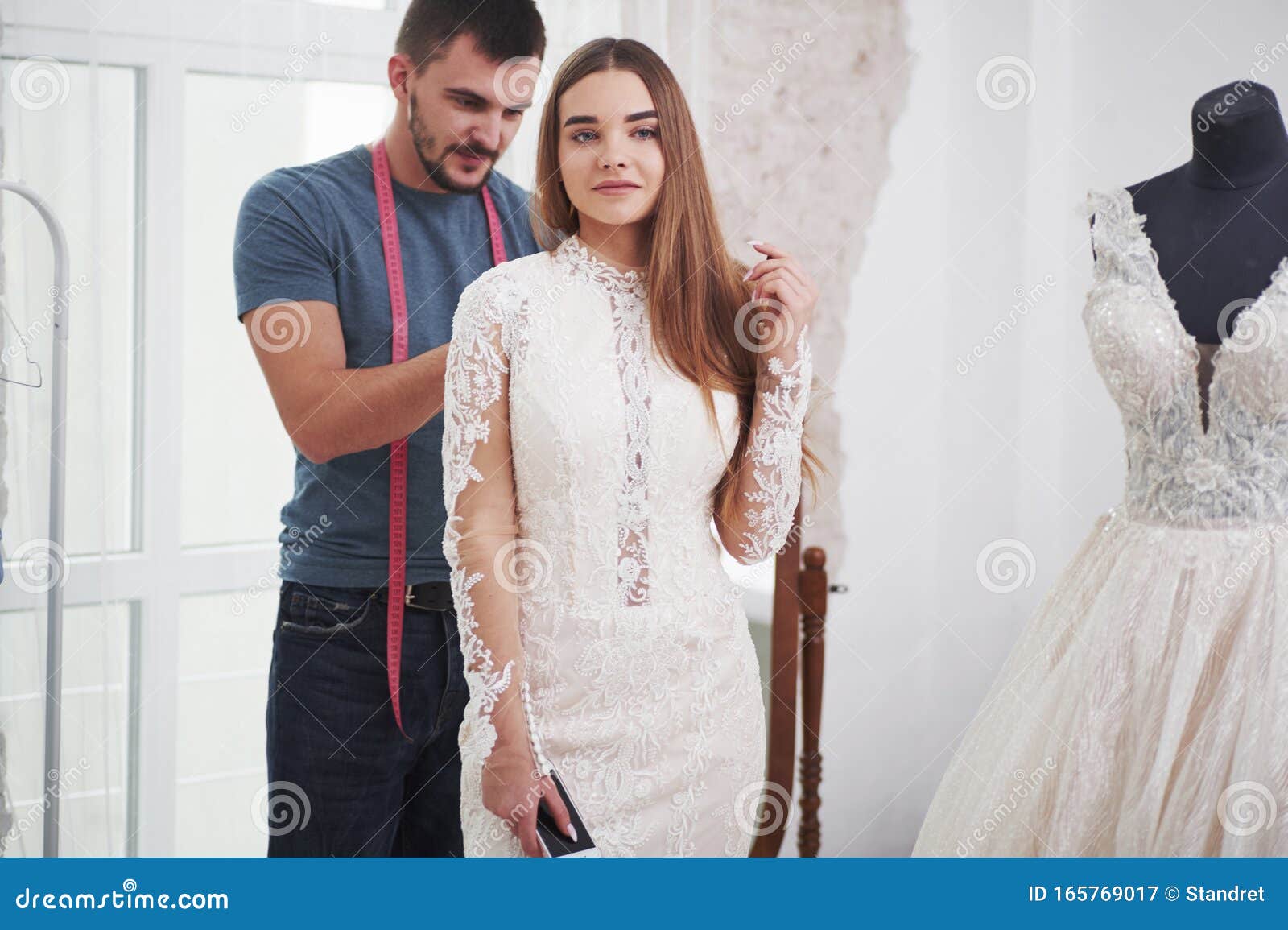 Almost Ready. the Process of Fitting the Dress in the Studio of Hand ...