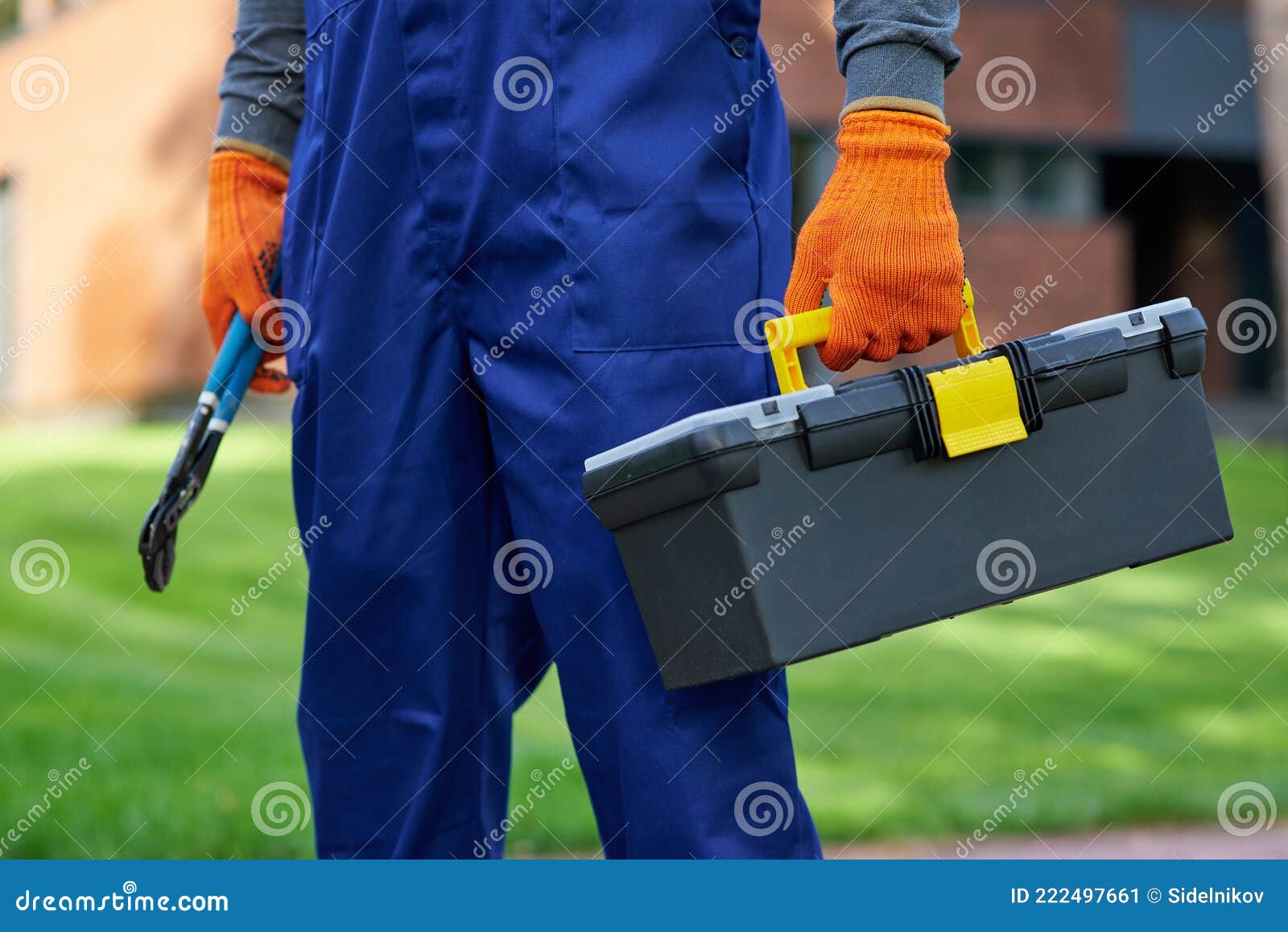 Ready for Renovation Work. Close Up of Builder Carrying Toolbox at ...