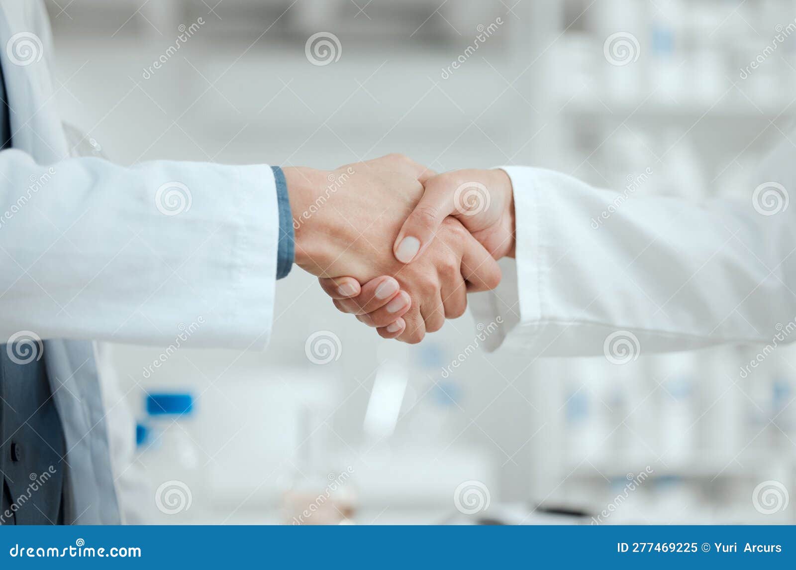 Ready To Get Started. Two Scientists Shaking Hands in Greeting. Stock ...