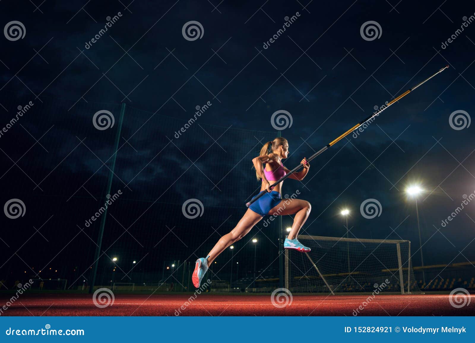 Female Pole Vaulter Training Or Performing At The Stadium Royalty-Free ...