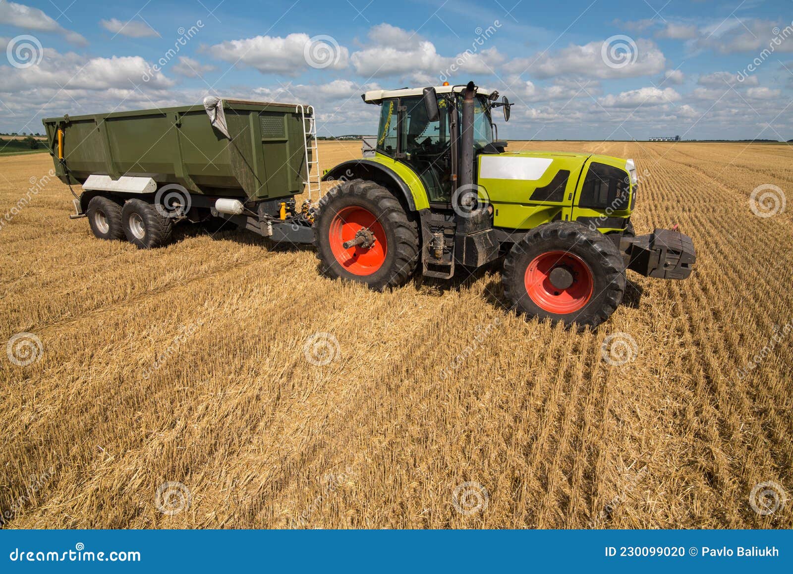 Ready To Work Green Tractor with a Trailer for the New Harvest of Crops ...