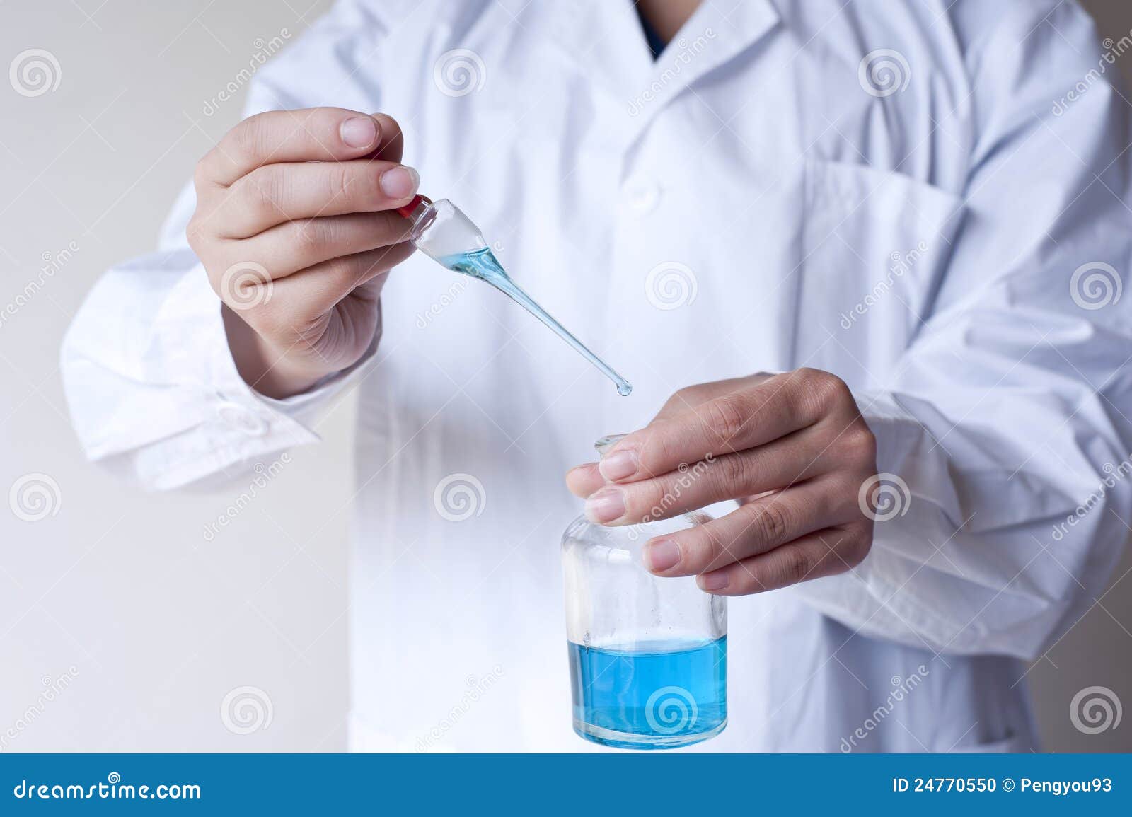 Reagent Bottle of Blue Liquid Stock Photo - Image of blue, scientific ...