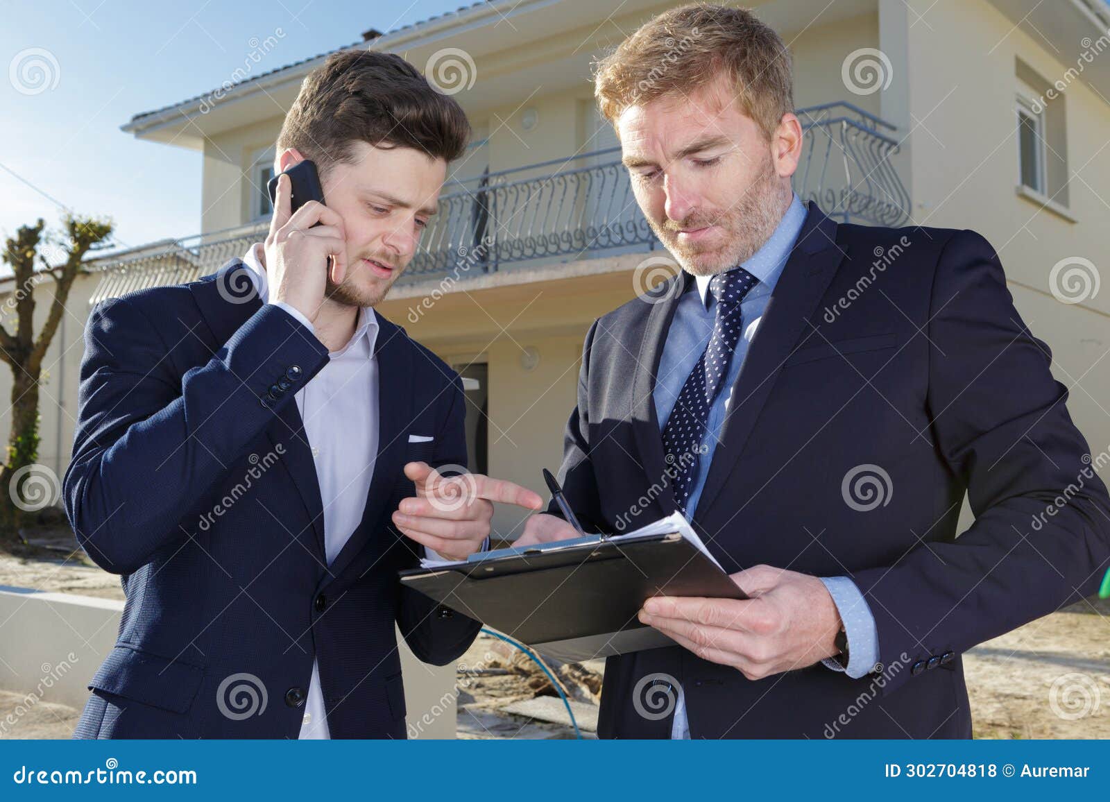 Real Estate Agent with Client Stock Photo - Image of outdoors, home ...