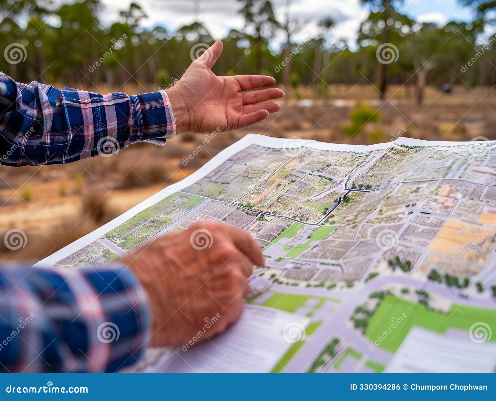 Real Estate Agent Explaining Cadastral Map Of Undeveloped Land For ...