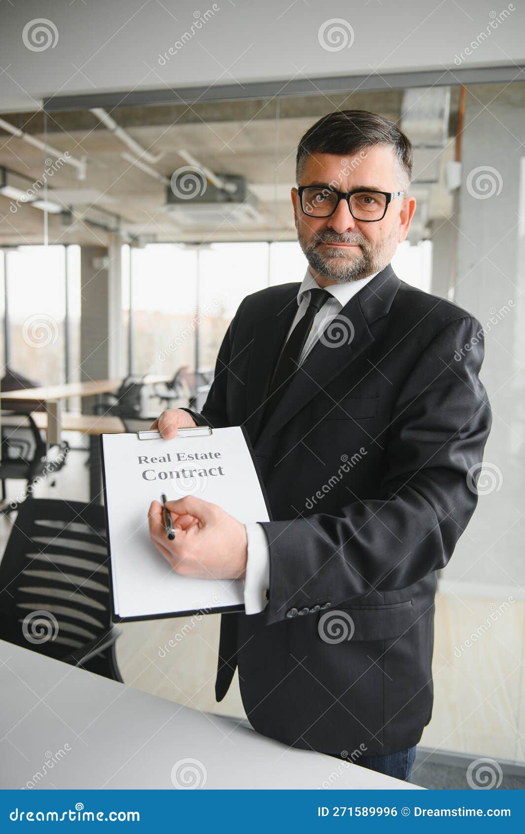 Real Estate Agent Explaining Contract Stock Photo - Image of office ...