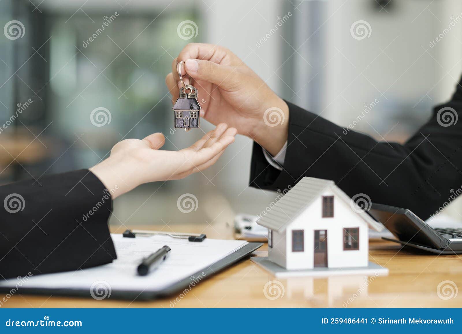 Real Estate Agent Giving House Keys To Client after Signing Contract ... Real Estate Agent Giving House Keys To Client after Signing Contract ...