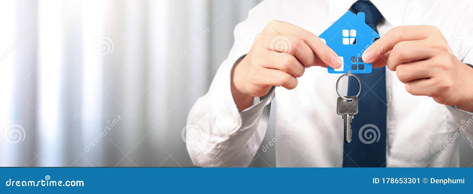 Real Estate Agent Handing Over House Keys in Hand Stock Image - Image ...