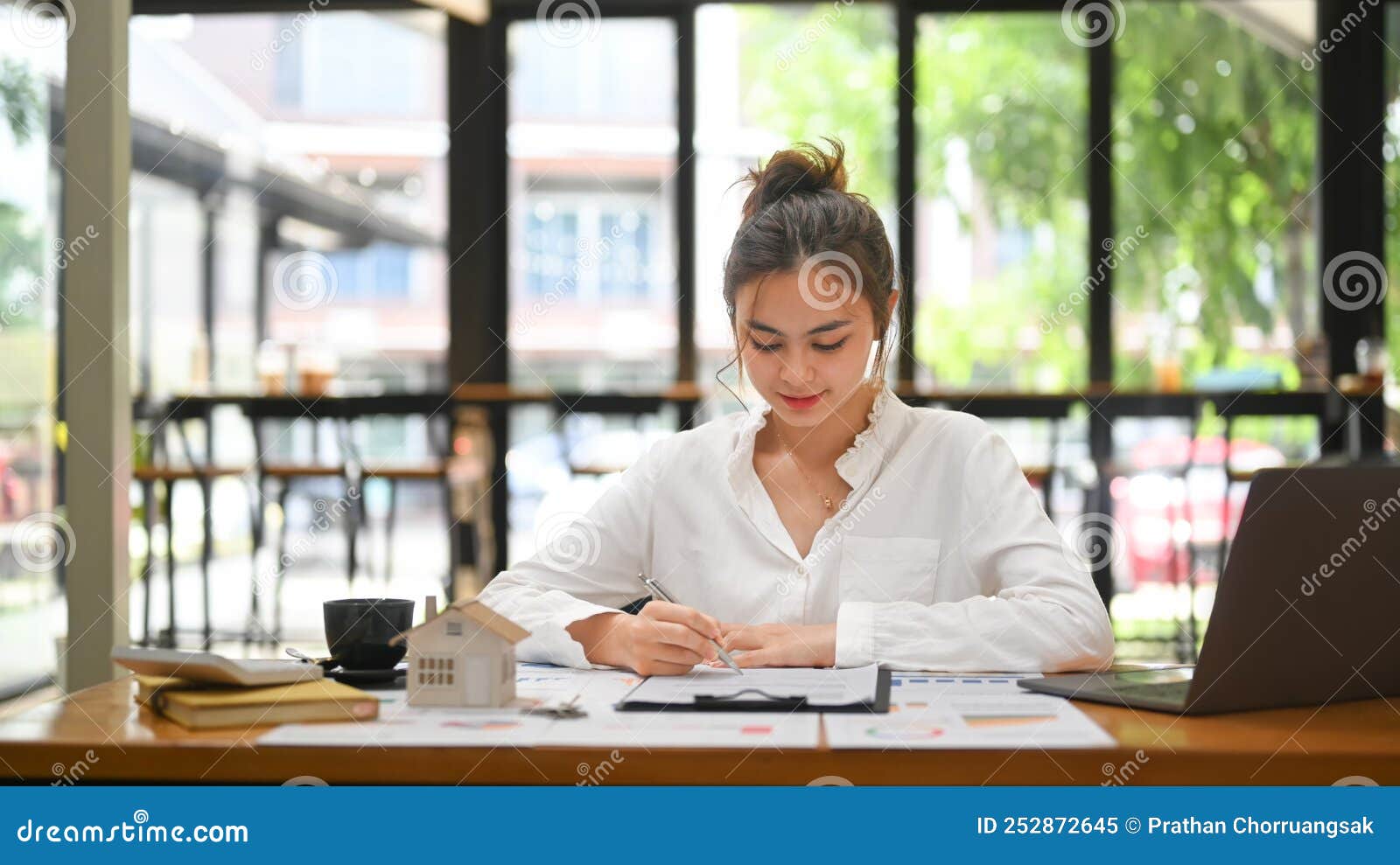Real Estate Agent Preparing Contract Document To Customer. Real Estate ... Real Estate Agent Preparing Contract Document To Customer. Real Estate ...