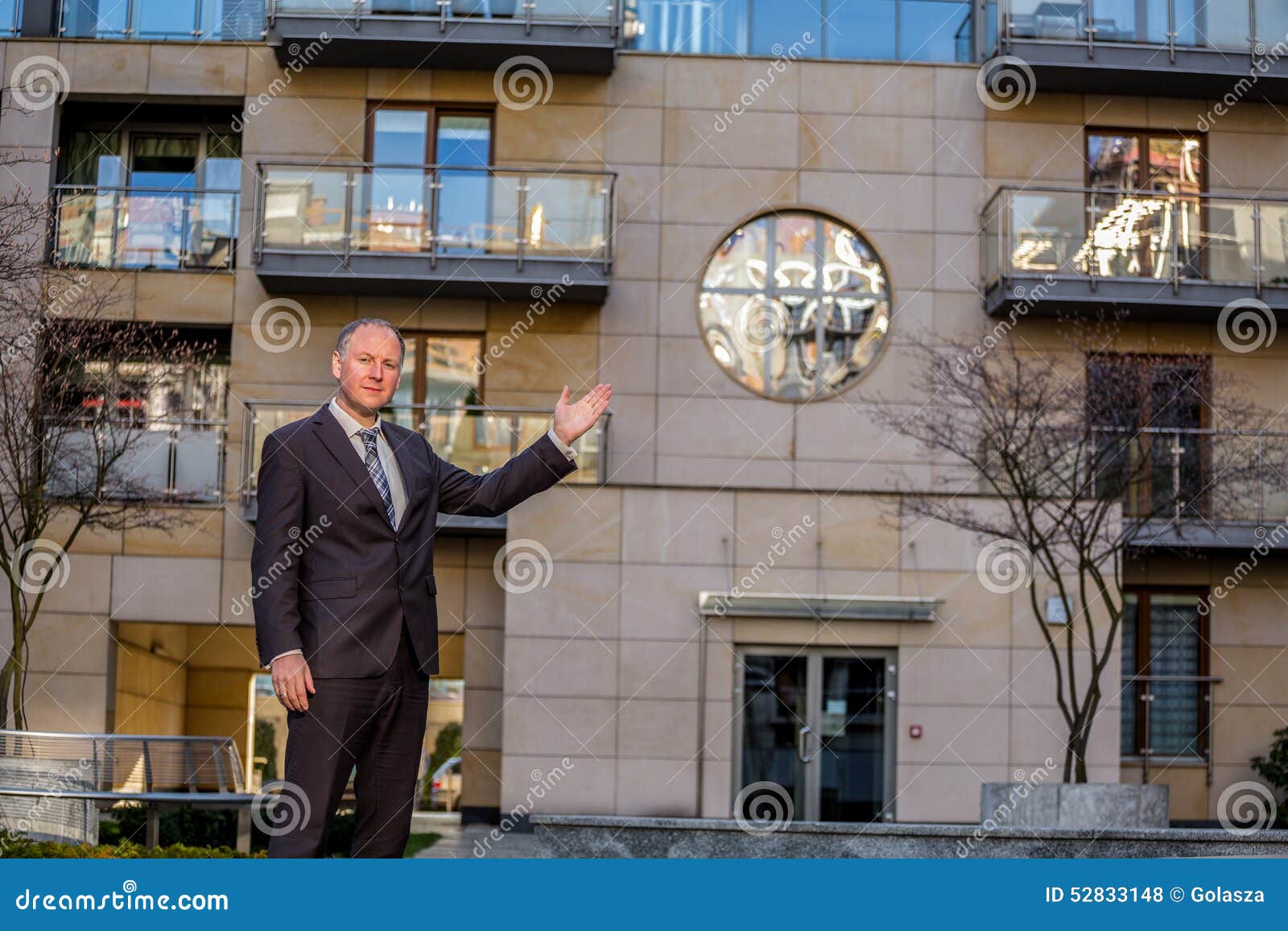 Real Estate Agent Presenting a Property Stock Photo - Image of agent ...