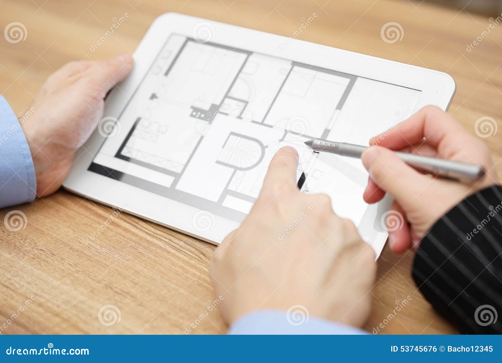 Real Estate Agent Showing Home Projection on Tablet Computer Stock ...