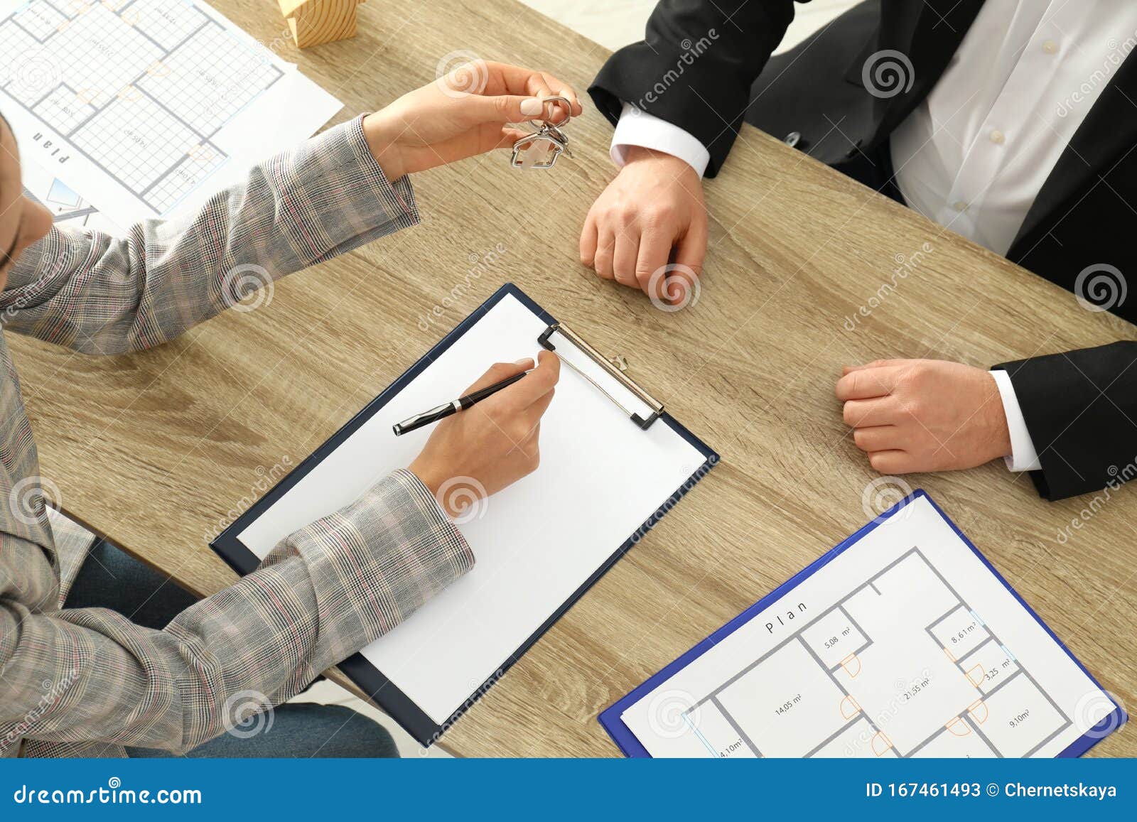 Real Estate Agent Working with Client at Table Stock Image - Image of ...