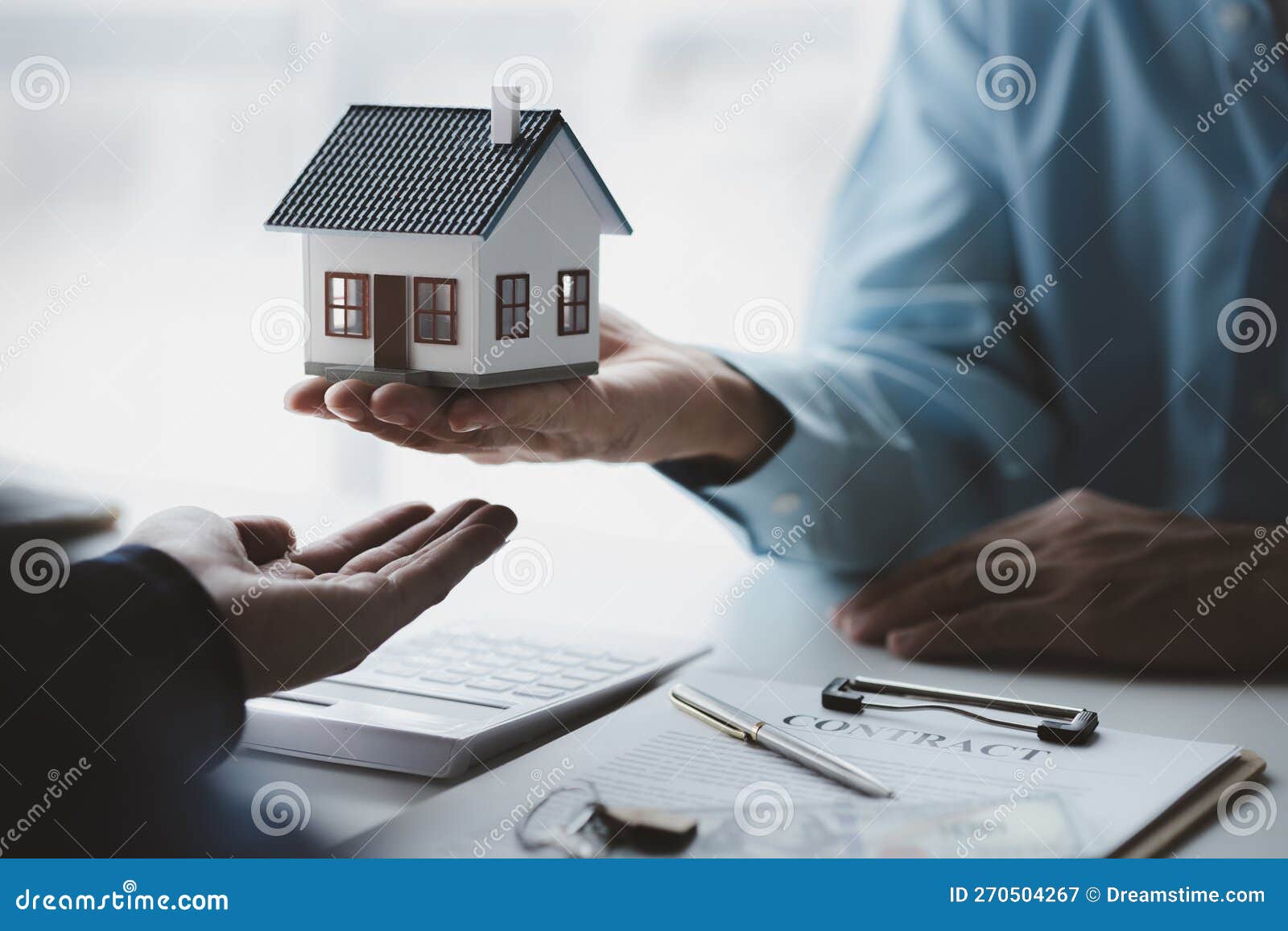 Real Estate Agents Explain Models of Housing Estates in Projects To ...