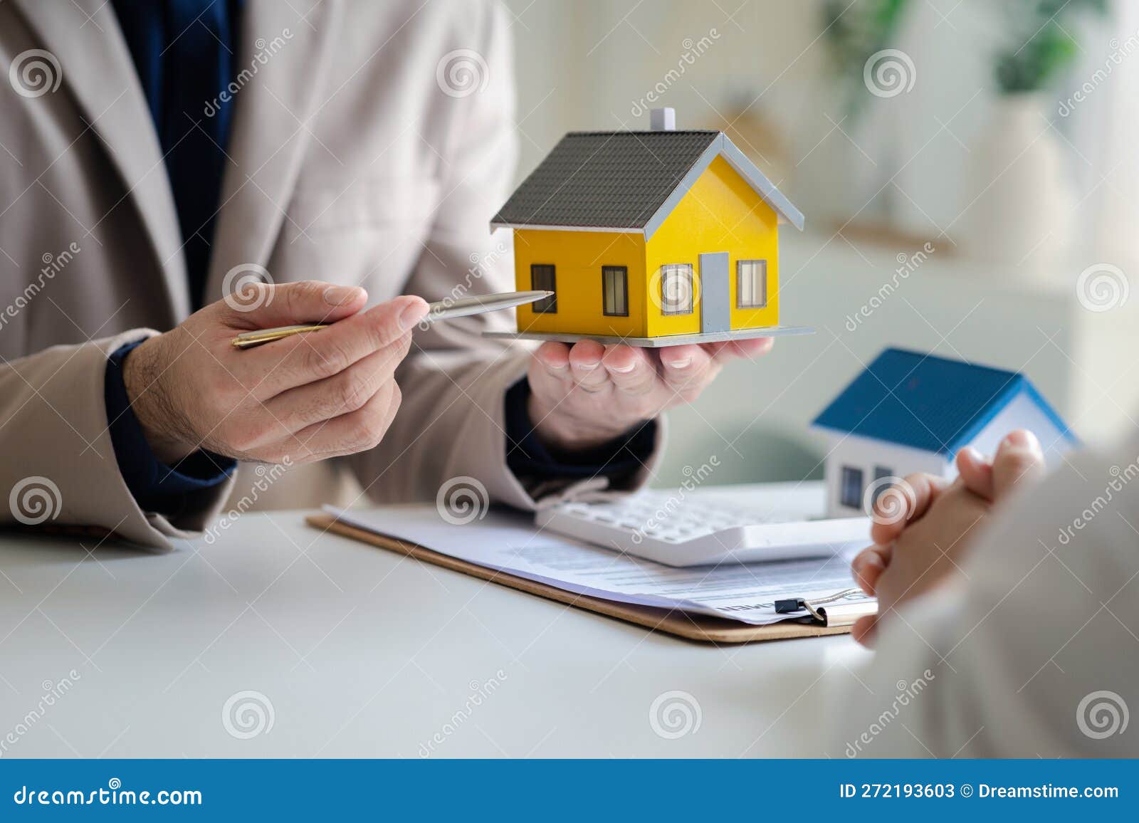 Real Estate Agents Explain Models of Housing Estates in Projects To ...