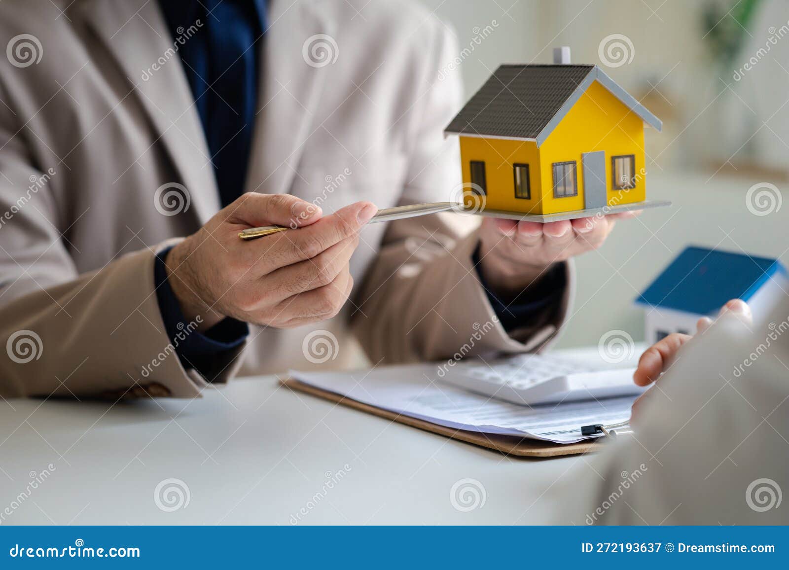 Real Estate Agents Explain Models of Housing Estates in Projects To ...