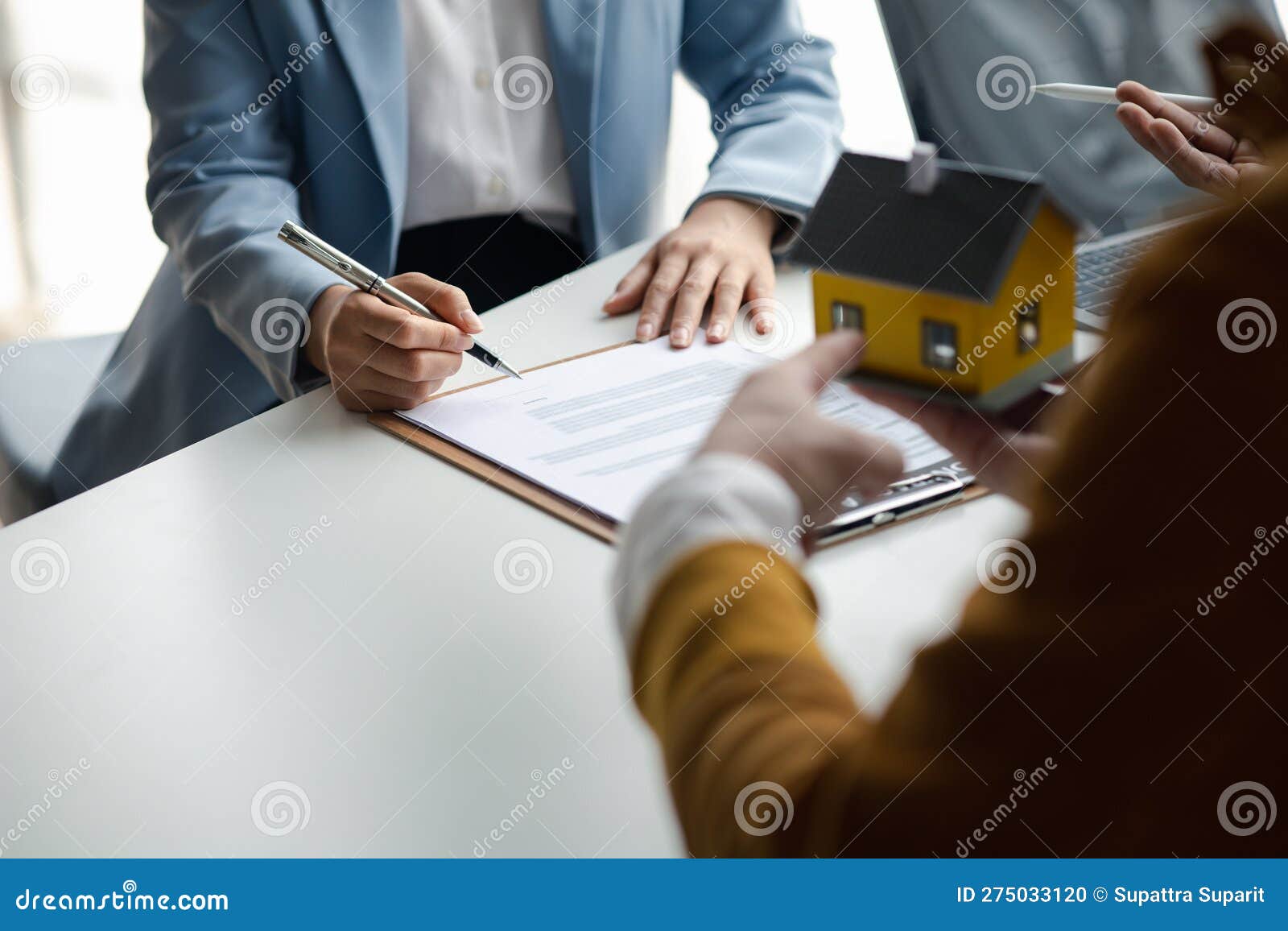 Real Estate Agents Explain Models of Housing Estates in Projects To ...