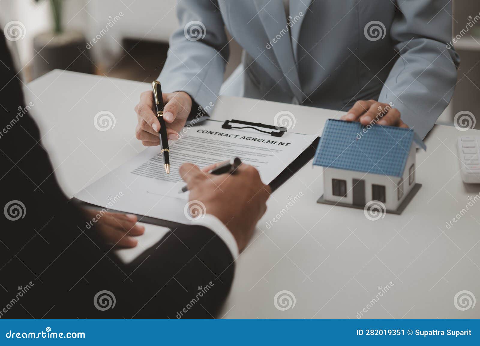 Real Estate Agents Explain Models of Housing Estates in Projects To ...