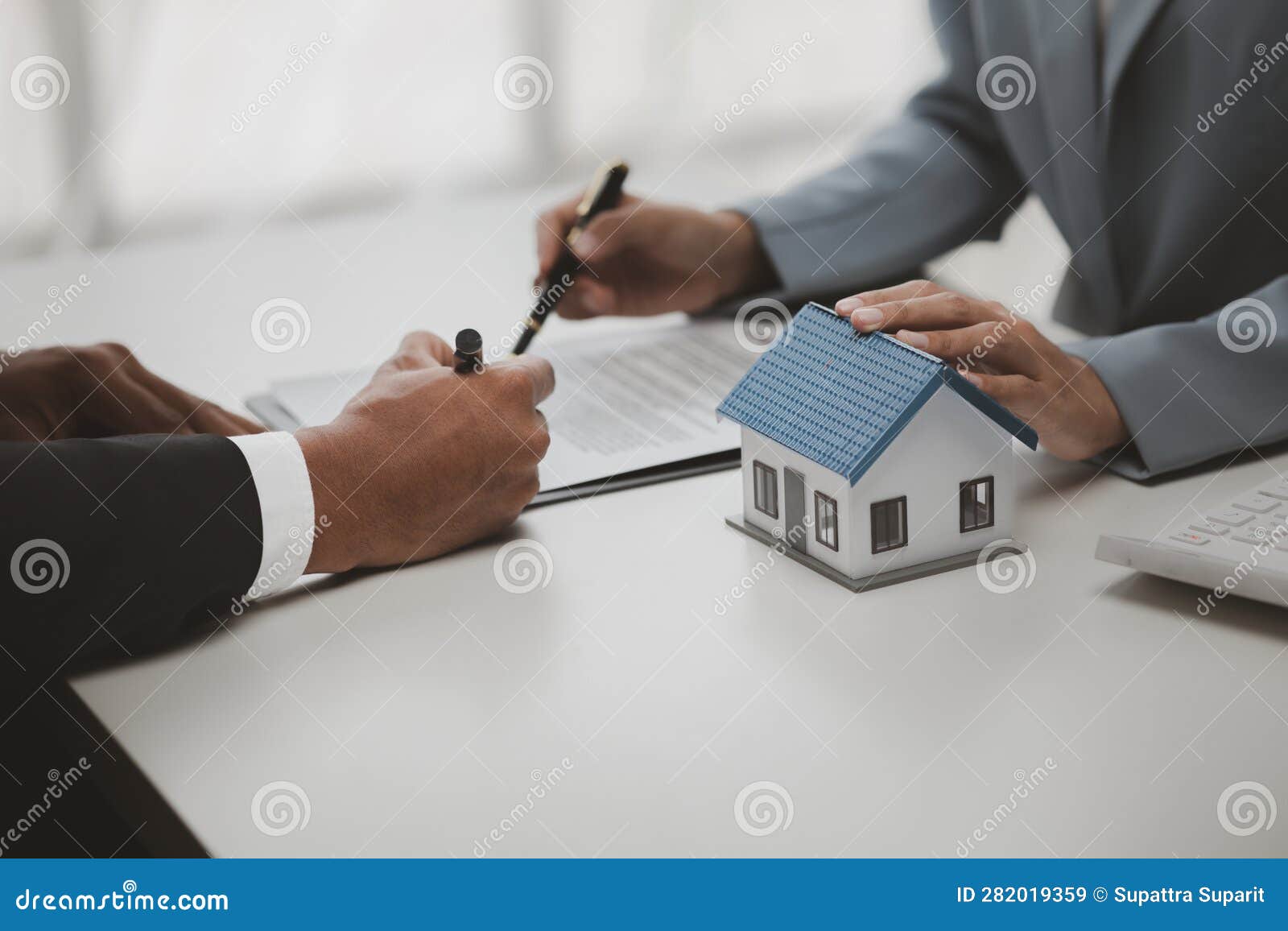 Real Estate Agents Explain Models of Housing Estates in Projects To ...